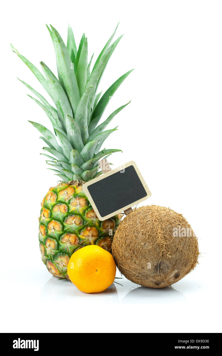 pineapple, mandarin , coconut and board isolated on white Stock Photo ...