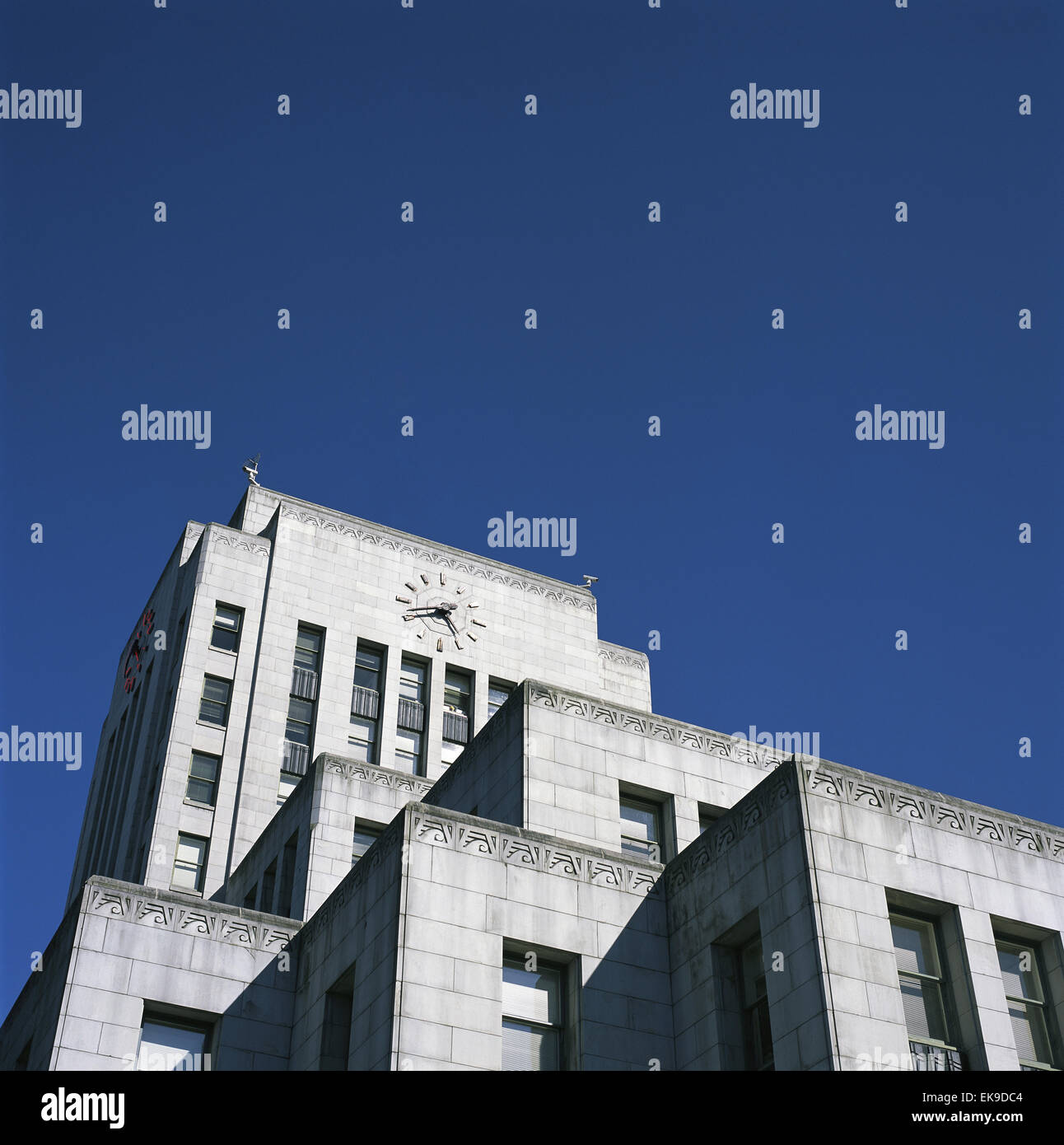 Large concrete building with blue sky Stock Photo - Alamy
