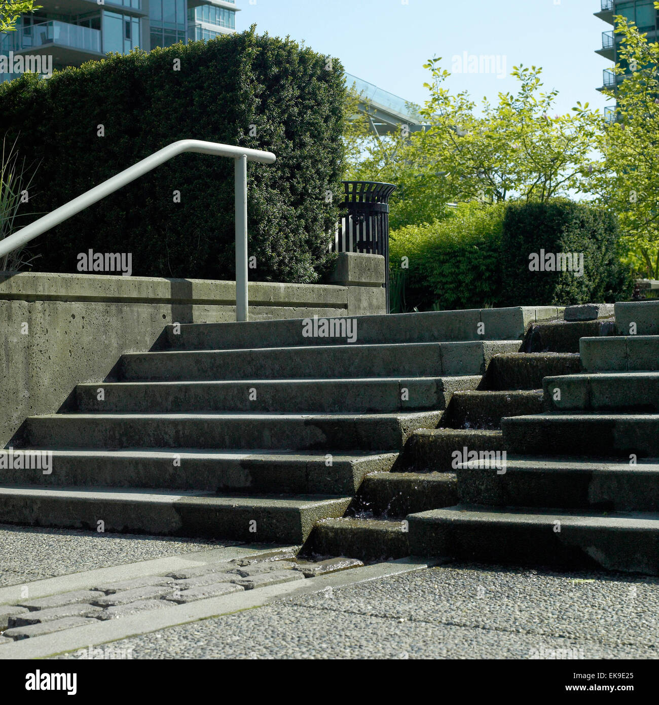 Concrete steps leading to an urban park Stock Photo - Alamy
