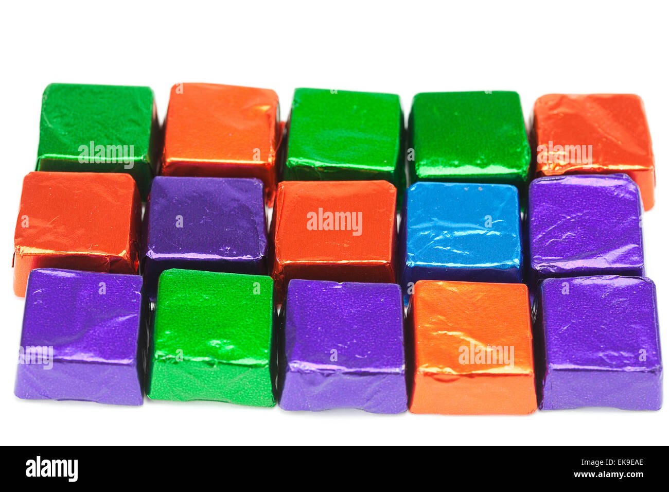 candies in shiny wrappers isolated on white Stock Photo - Alamy