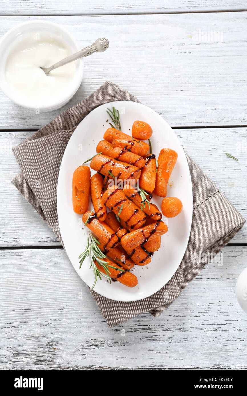 Baked carrot on plate, food Stock Photo - Alamy