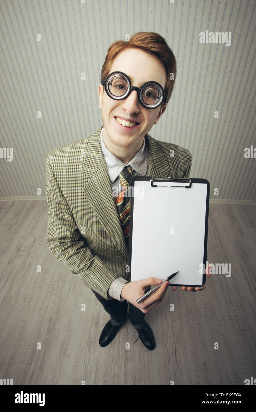 Business man nerd holds a blank sign Stock Photo - Alamy