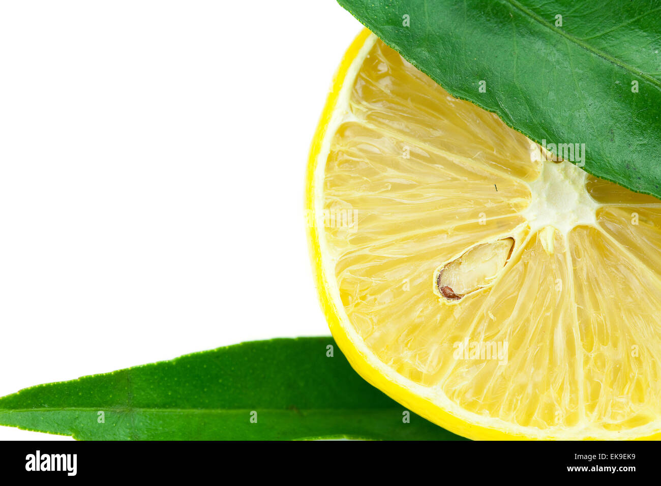 lemon with green leaf isolated on white Stock Photo - Alamy