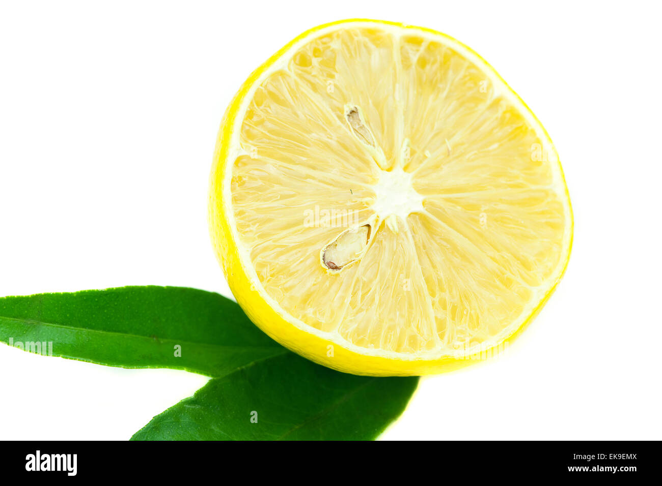 lemon with green leaf isolated on white Stock Photo - Alamy