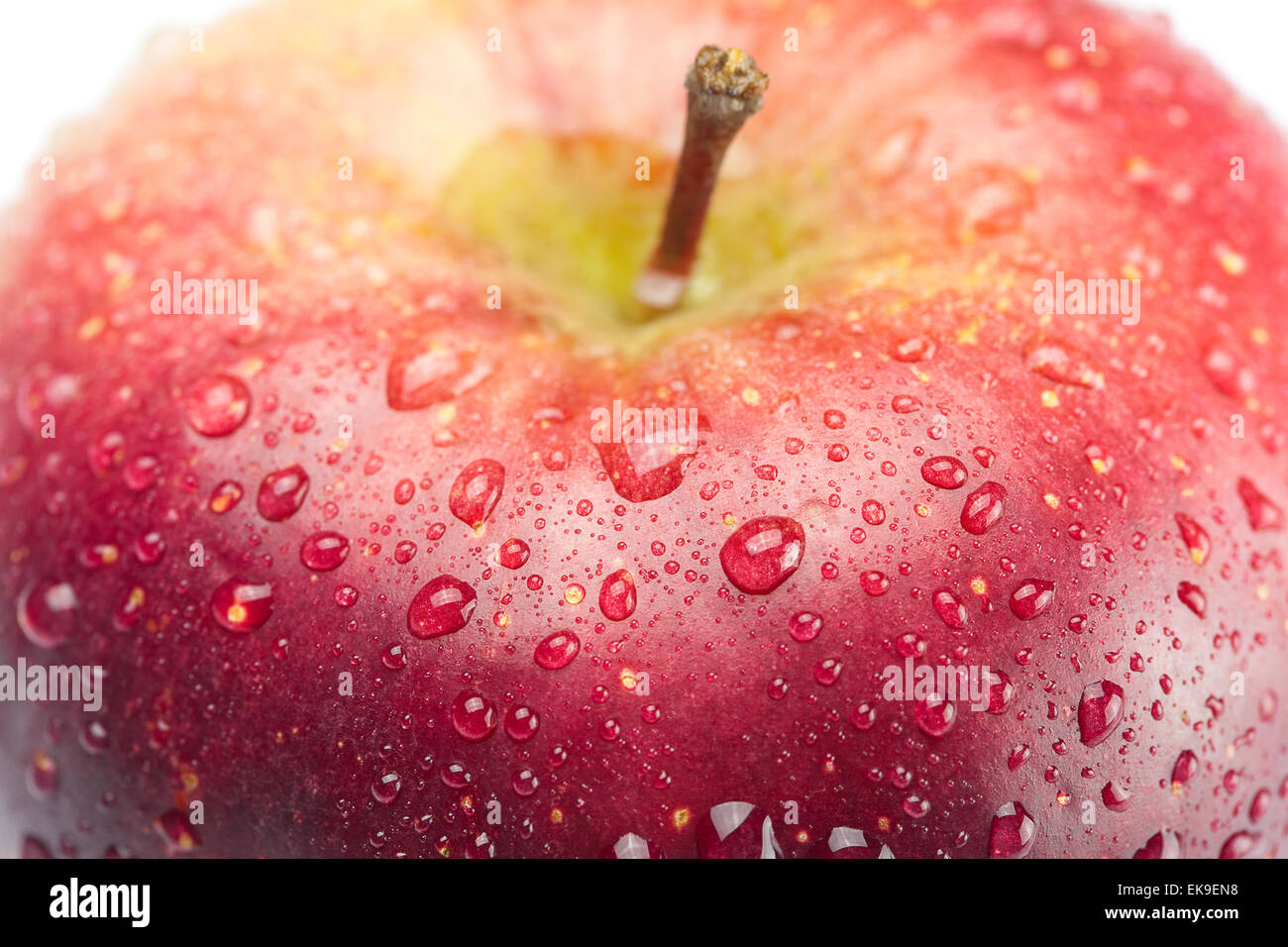 red apple with water drops isolated on white Stock Photo - Alamy