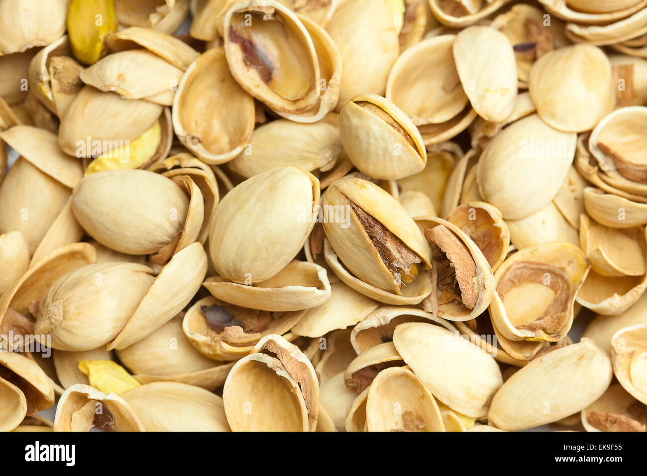 background from the shell of pistachio nuts Stock Photo - Alamy
