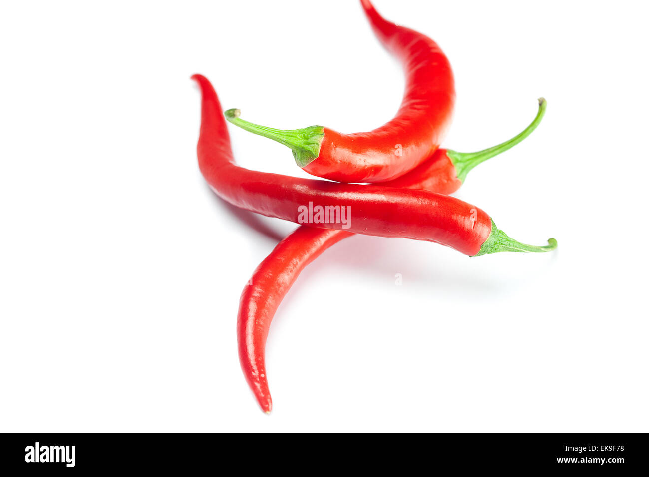 Vibrant red chili peppers Cut Out Stock Images & Pictures - Alamy