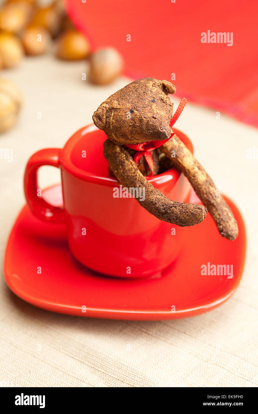 Teddy bear handmade in a cup and nuts Stock Photo - Alamy