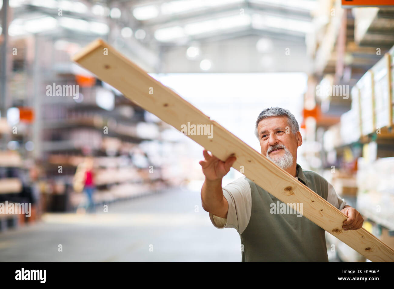 Senior man buying construction wood in a DIY store Stock Photo - Alamy