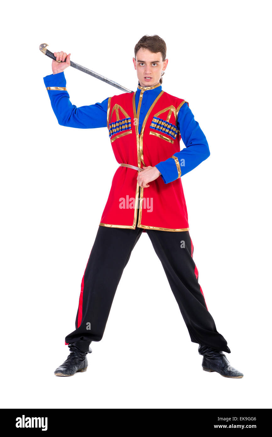 Russian cossack dance. Young dancer posing with sword Stock Photo - Alamy