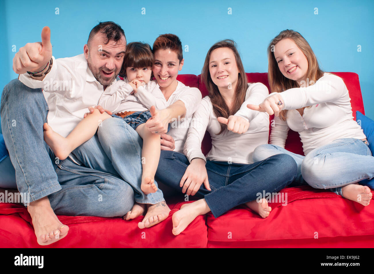 happy family on the couch Stock Photo - Alamy
