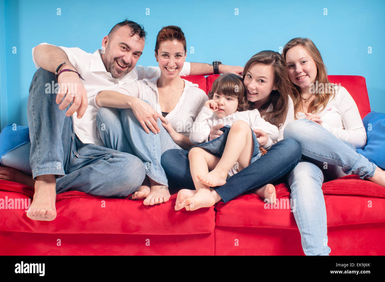 happy family on the couch Stock Photo - Alamy