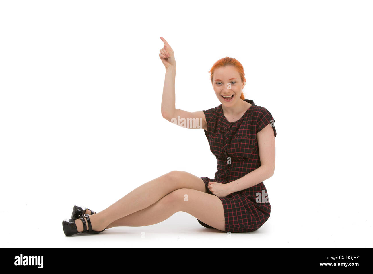 Young female laughing pointing hi-res stock photography and images - Alamy