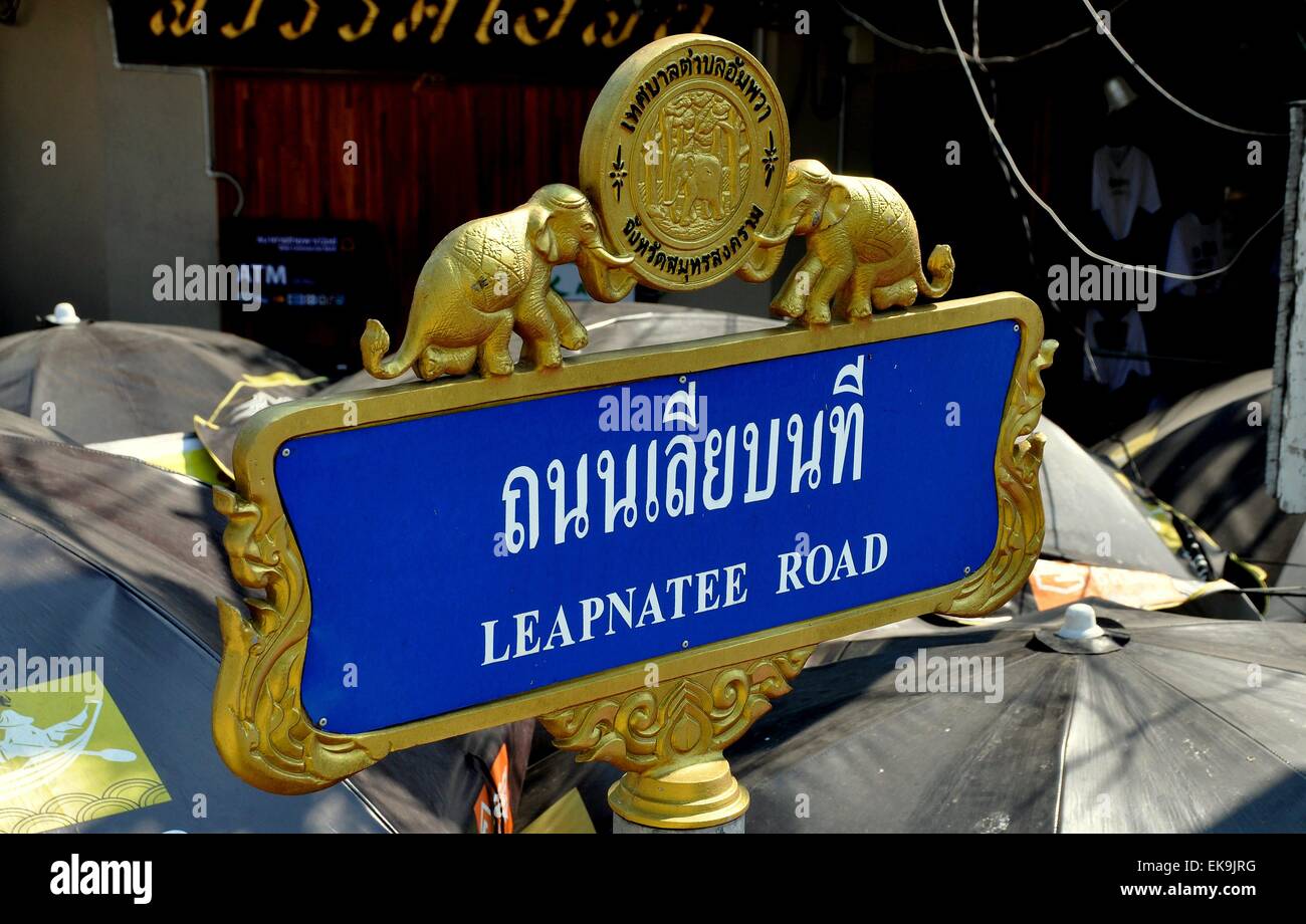 Amphawa, Thailand: Gilded street sign post at Leapnatee Road with two ...