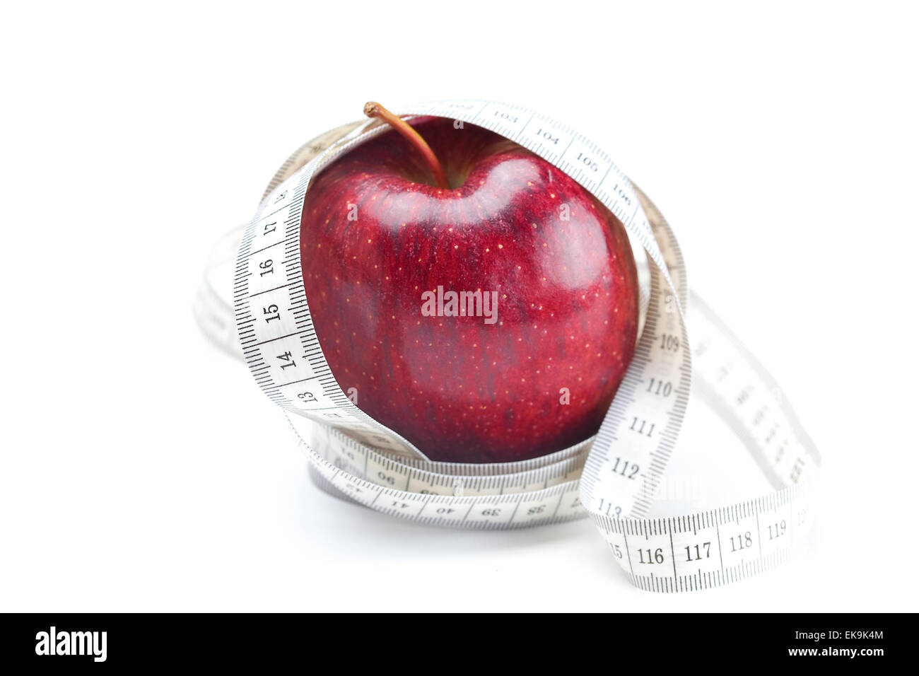 apple and measure tape isolated on white Stock Photo - Alamy