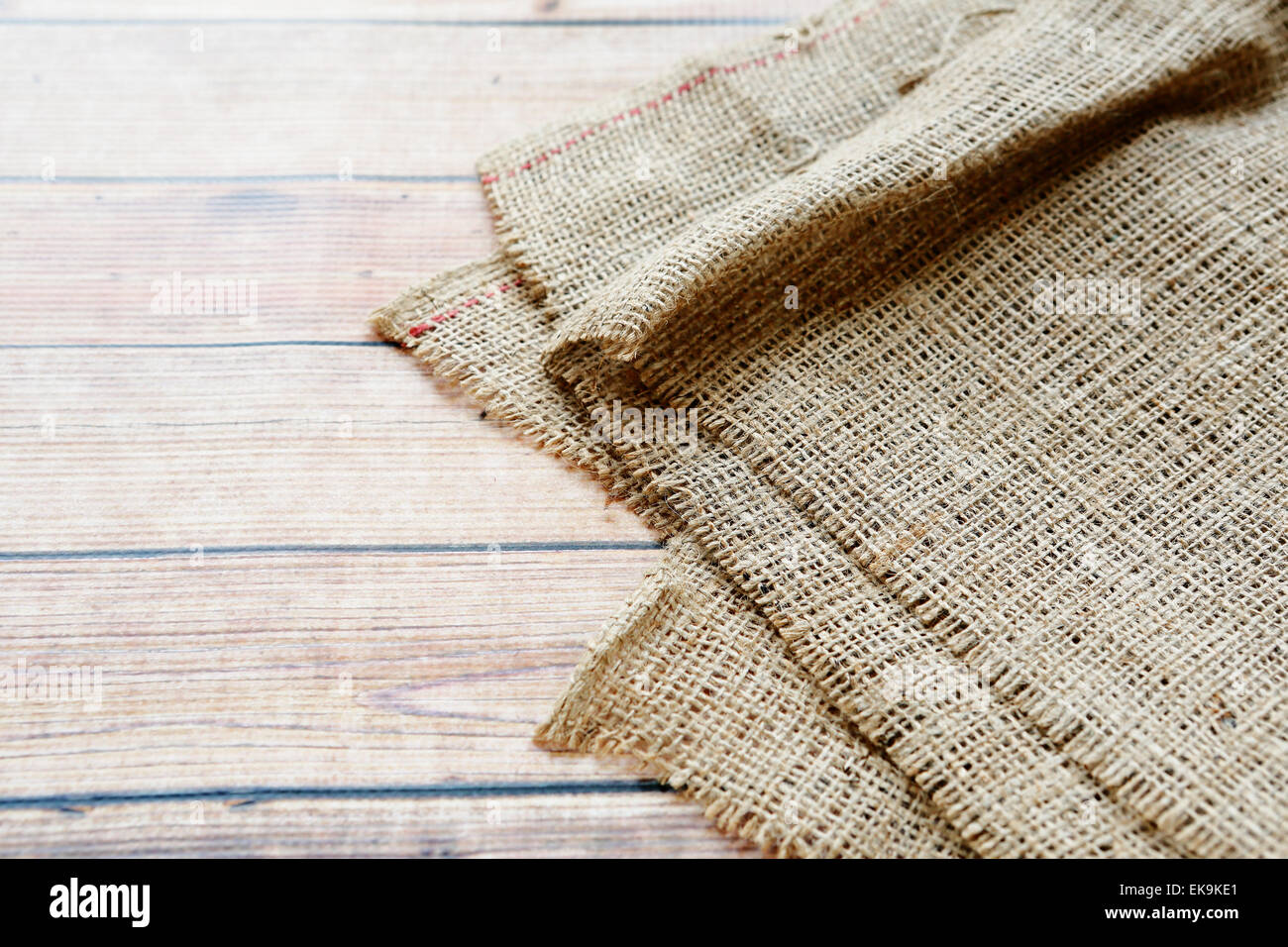 Sackcloth on wooden boards, copyspace Stock Photo - Alamy