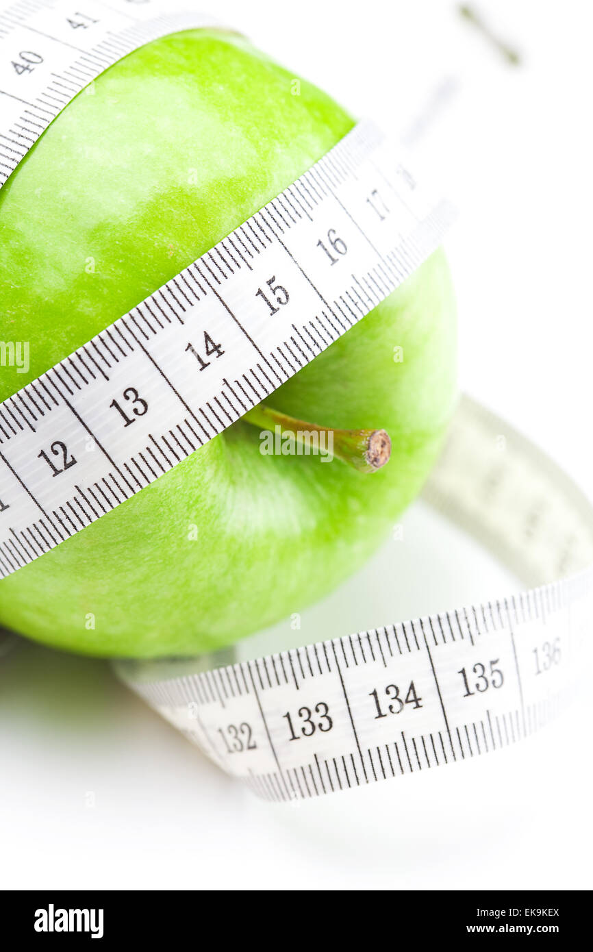 apple and measure tape isolated on white Stock Photo - Alamy