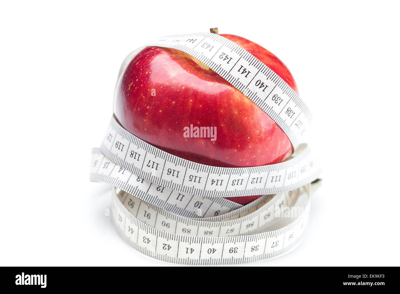 apple and measure tape isolated on white Stock Photo - Alamy
