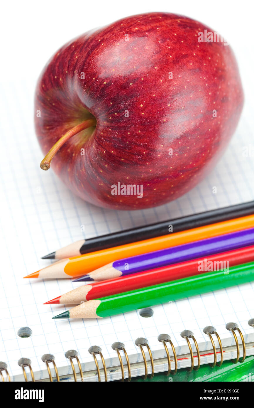 apple, notebooks and pencils isolated on white Stock Photo - Alamy