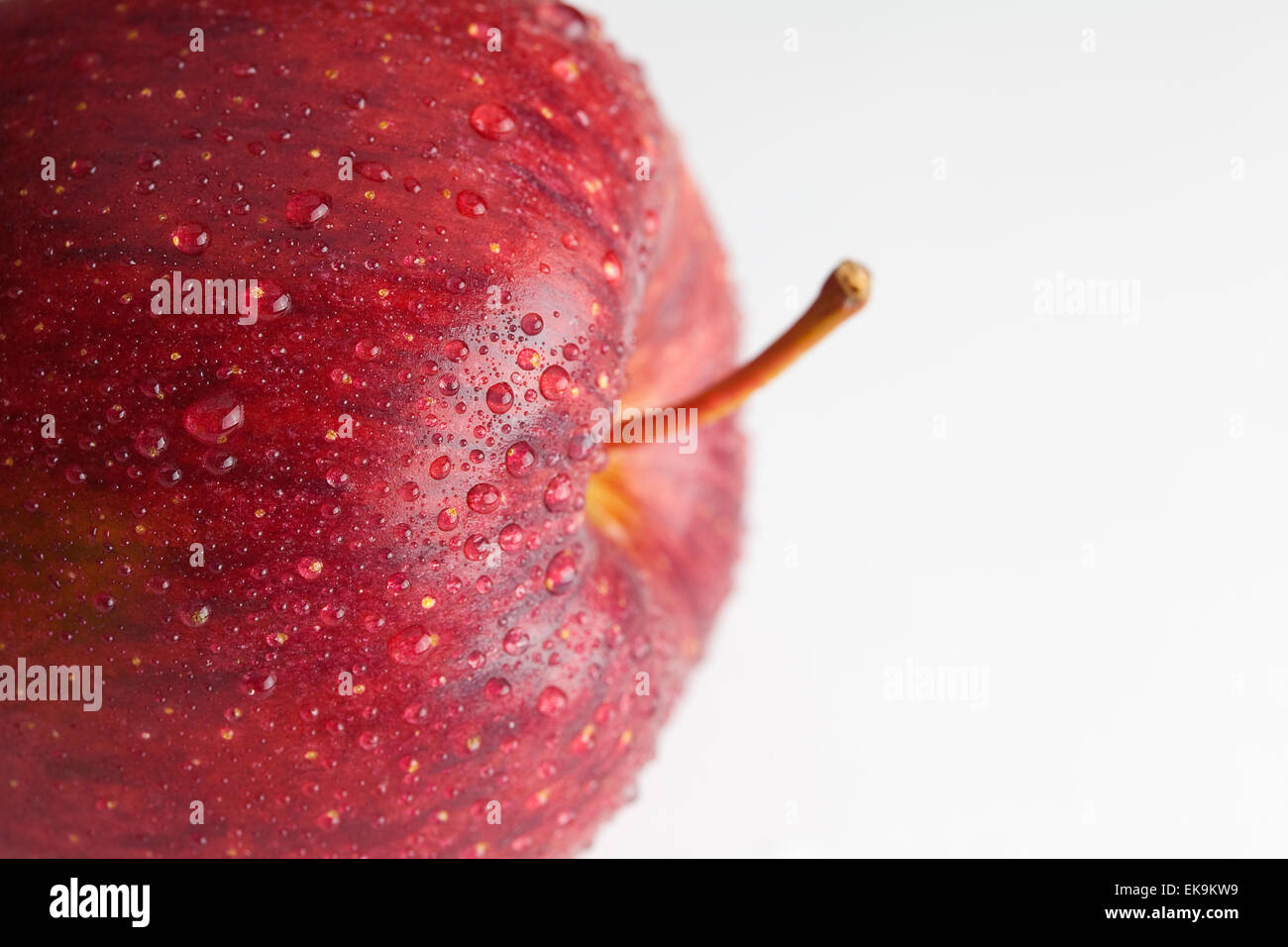 apple with water drops isolated on white Stock Photo - Alamy