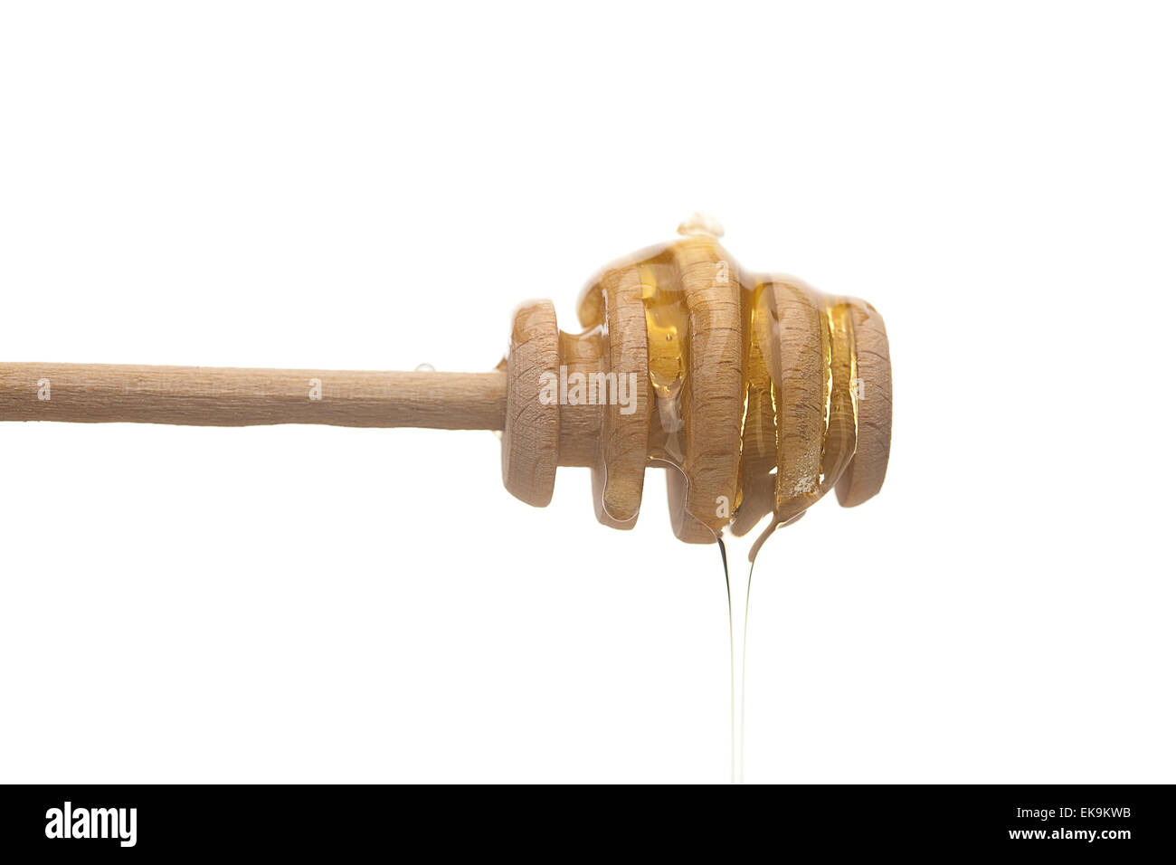 stick to honey is isolated on white Stock Photo - Alamy