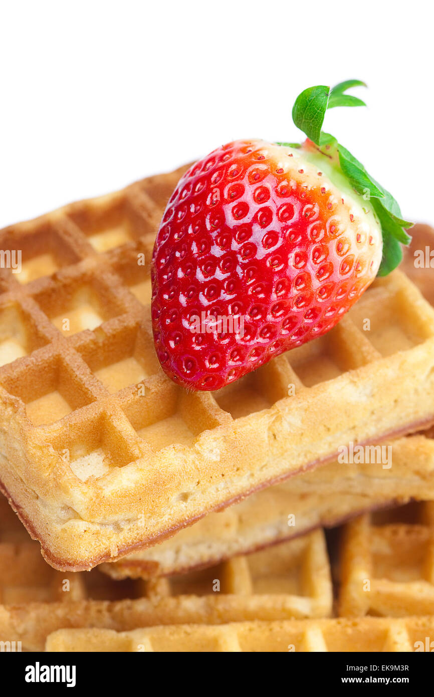 big juicy ripe strawberries and waffles isolated on white Stock Photo ...