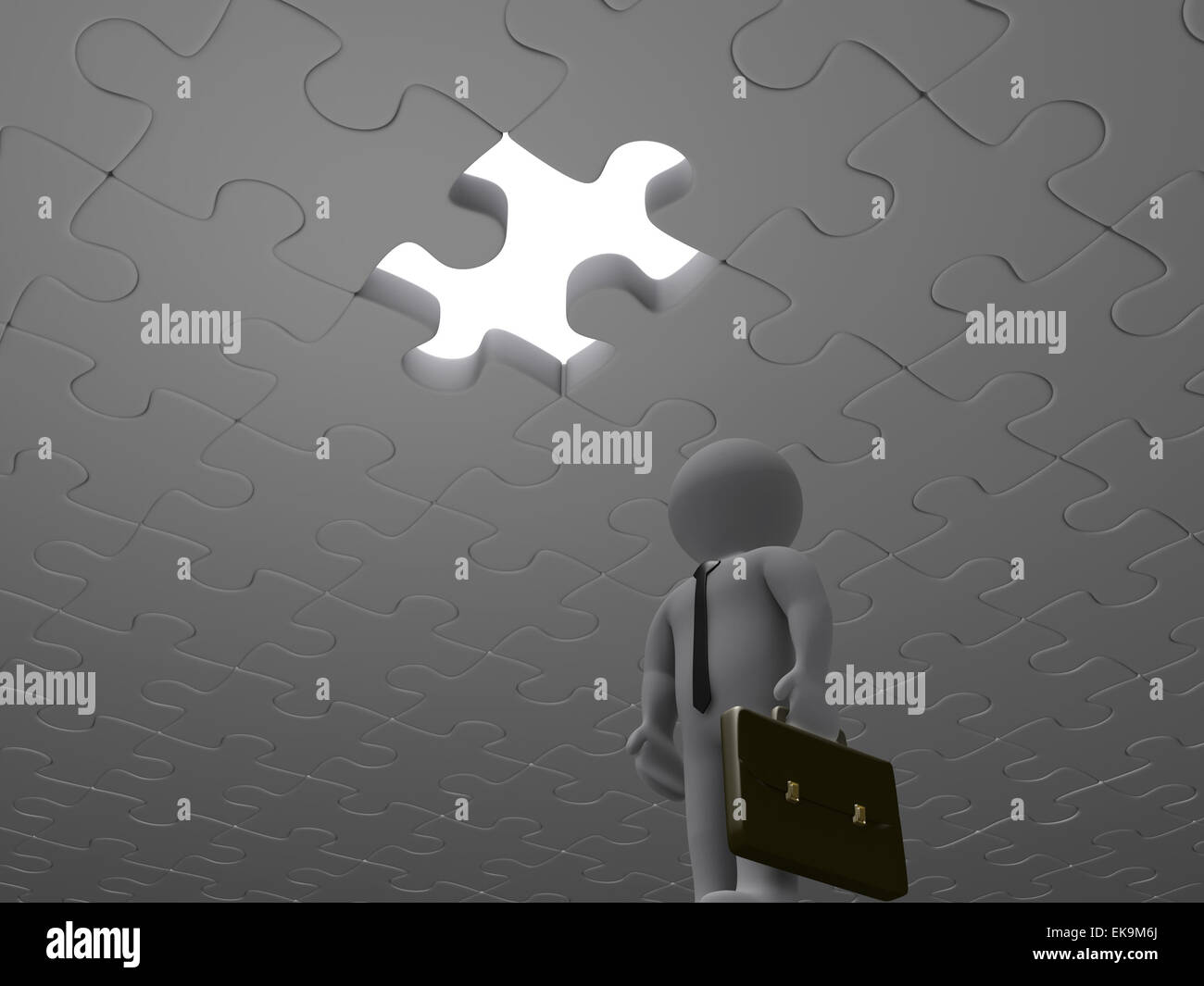 Businessman trapped under puzzle pieces Stock Photo - Alamy