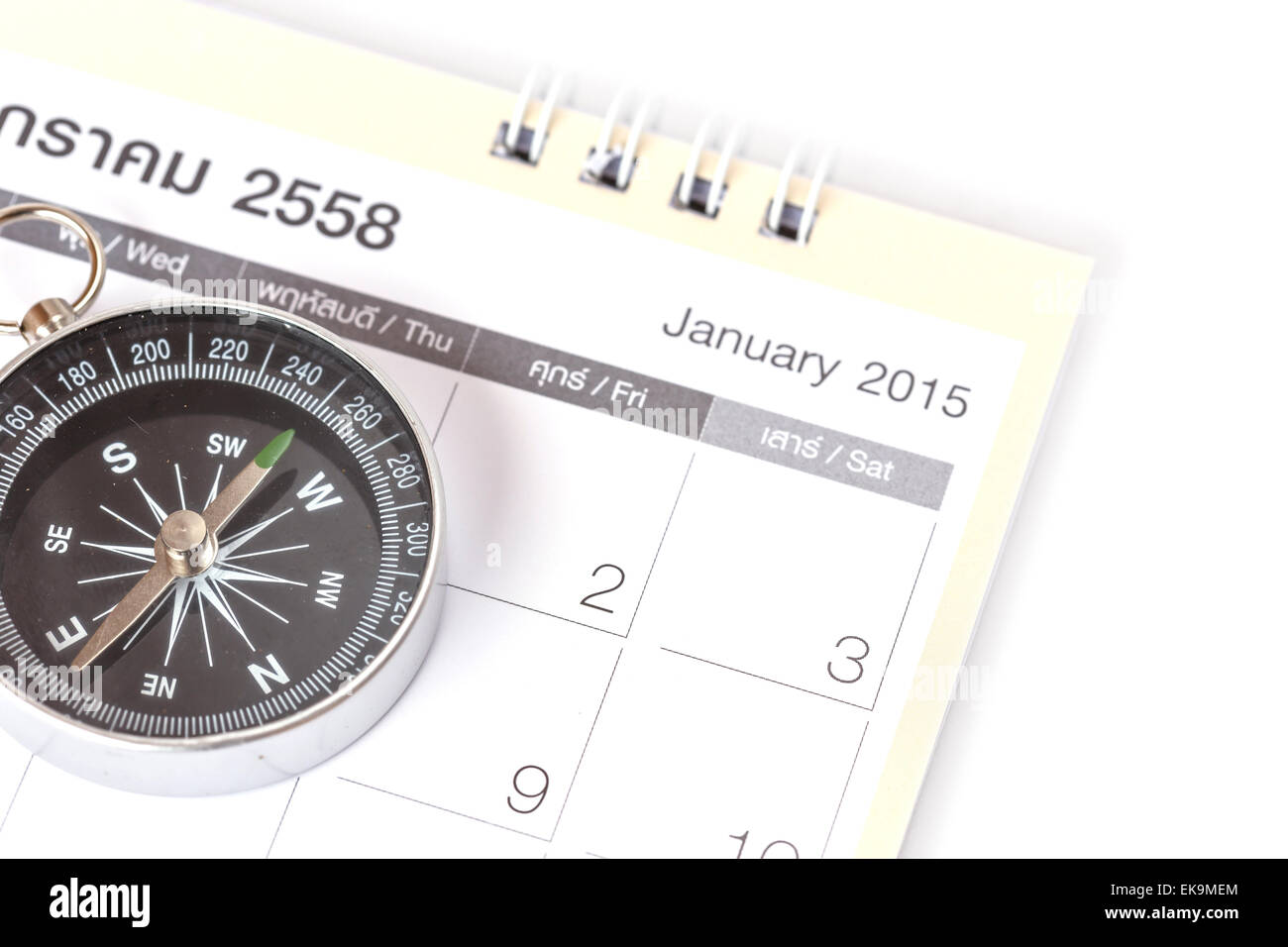 Close up Compass on calendar Stock Photo - Alamy
