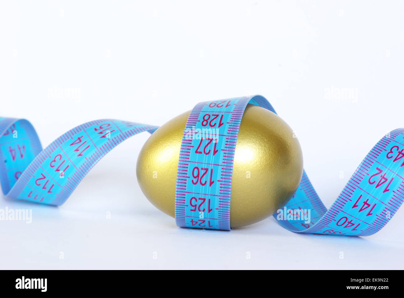 egg with measuring tape Stock Photo - Alamy