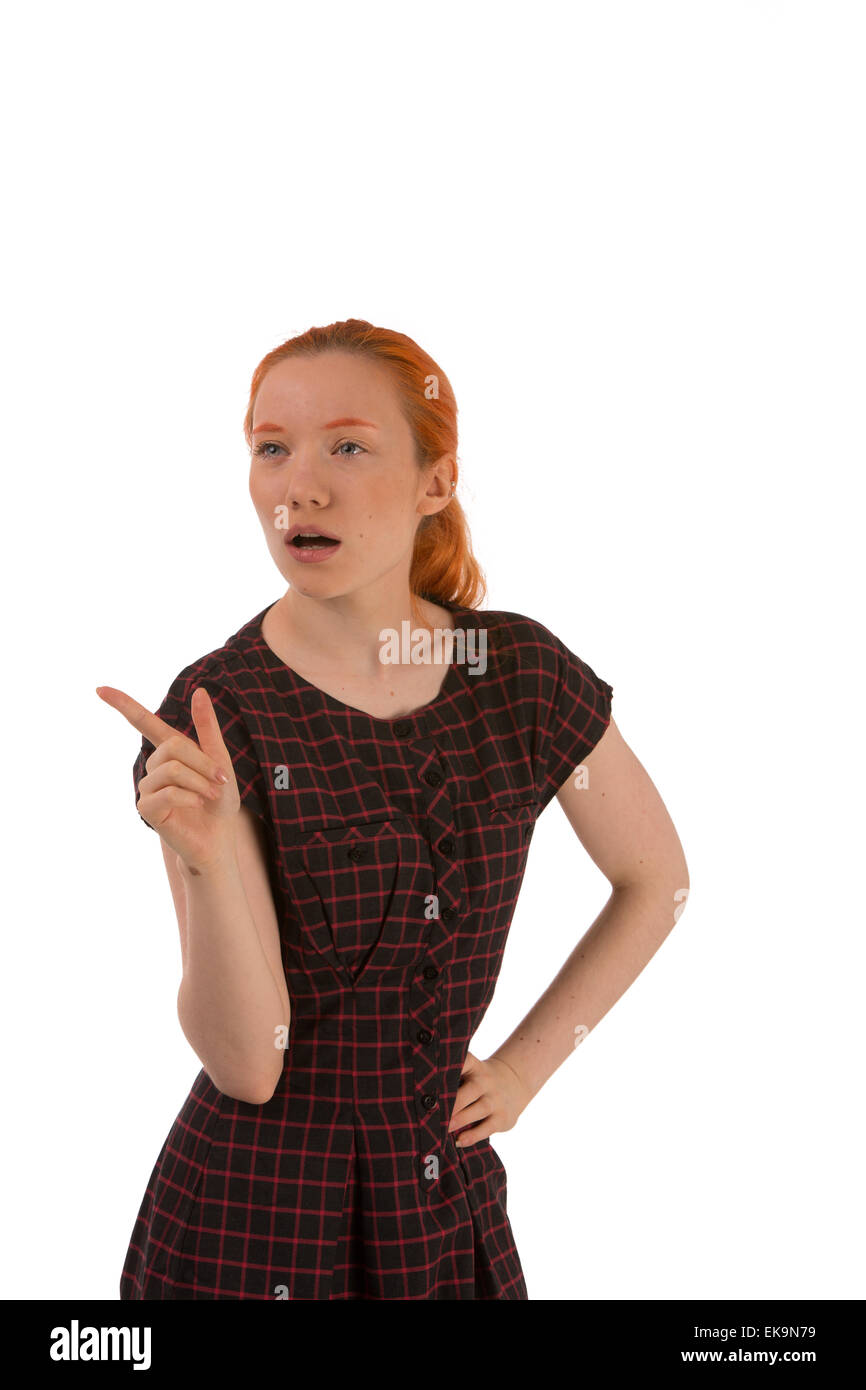 Woman thinking and pointing Stock Photo - Alamy