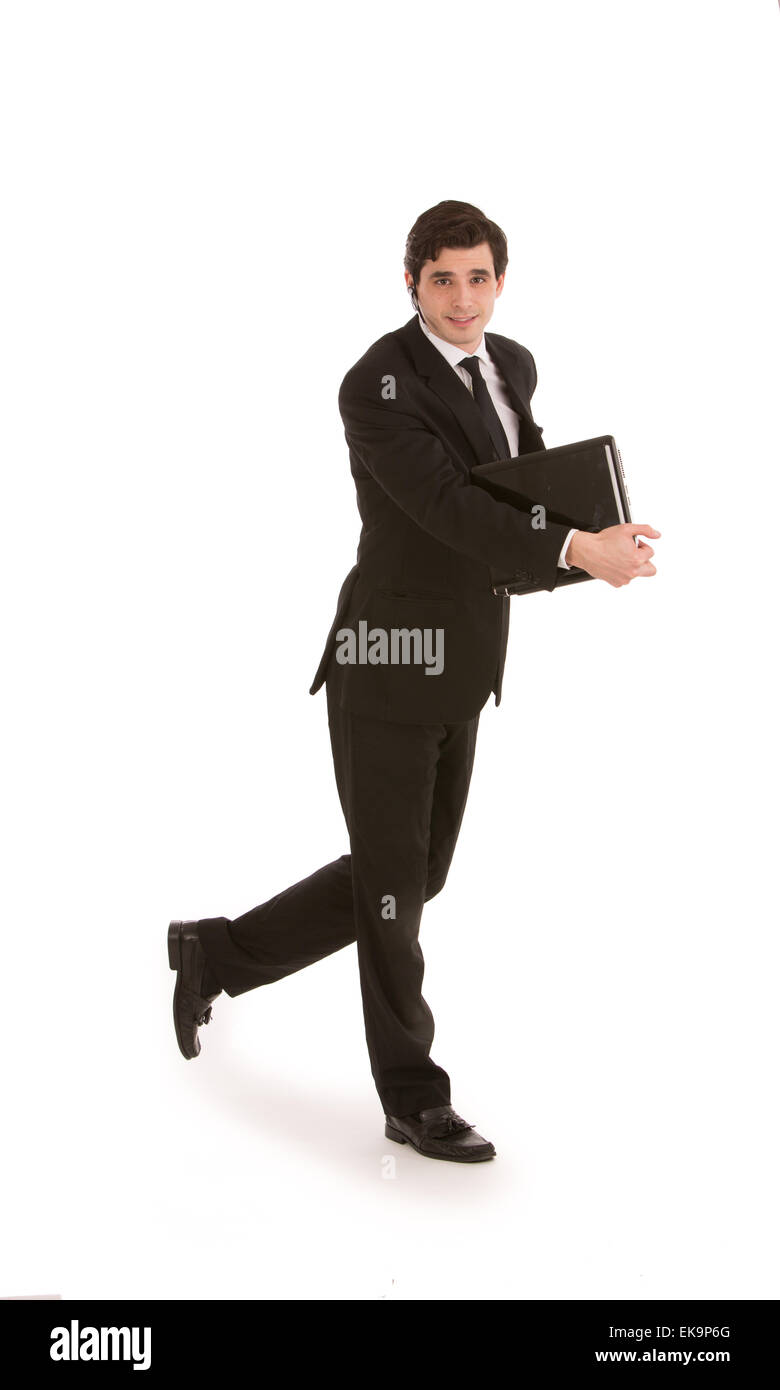 Businessman walking with a folder Stock Photo - Alamy