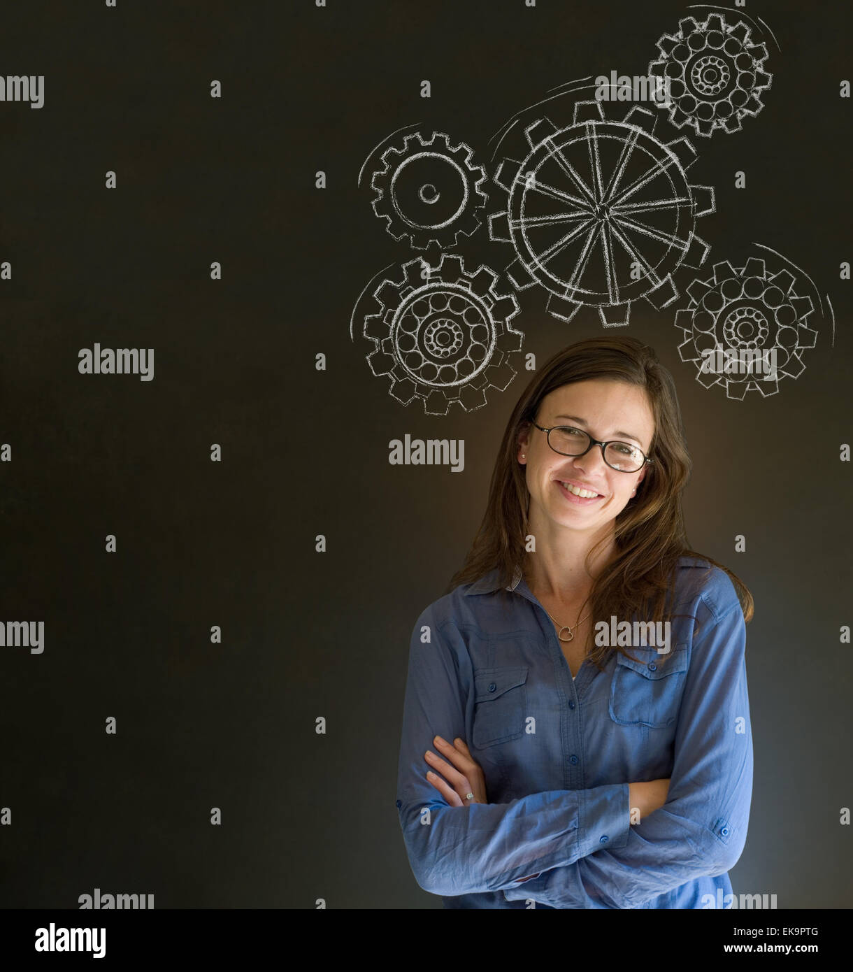Woman thinking with turning gear cogs or gears Stock Photo - Alamy