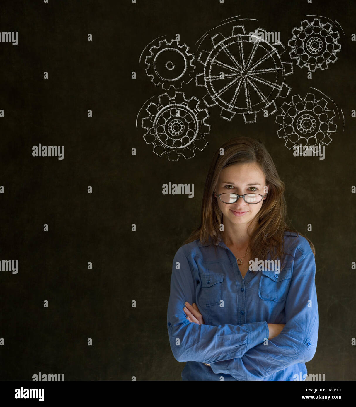 Woman thinking with turning gear cogs or gears Stock Photo - Alamy