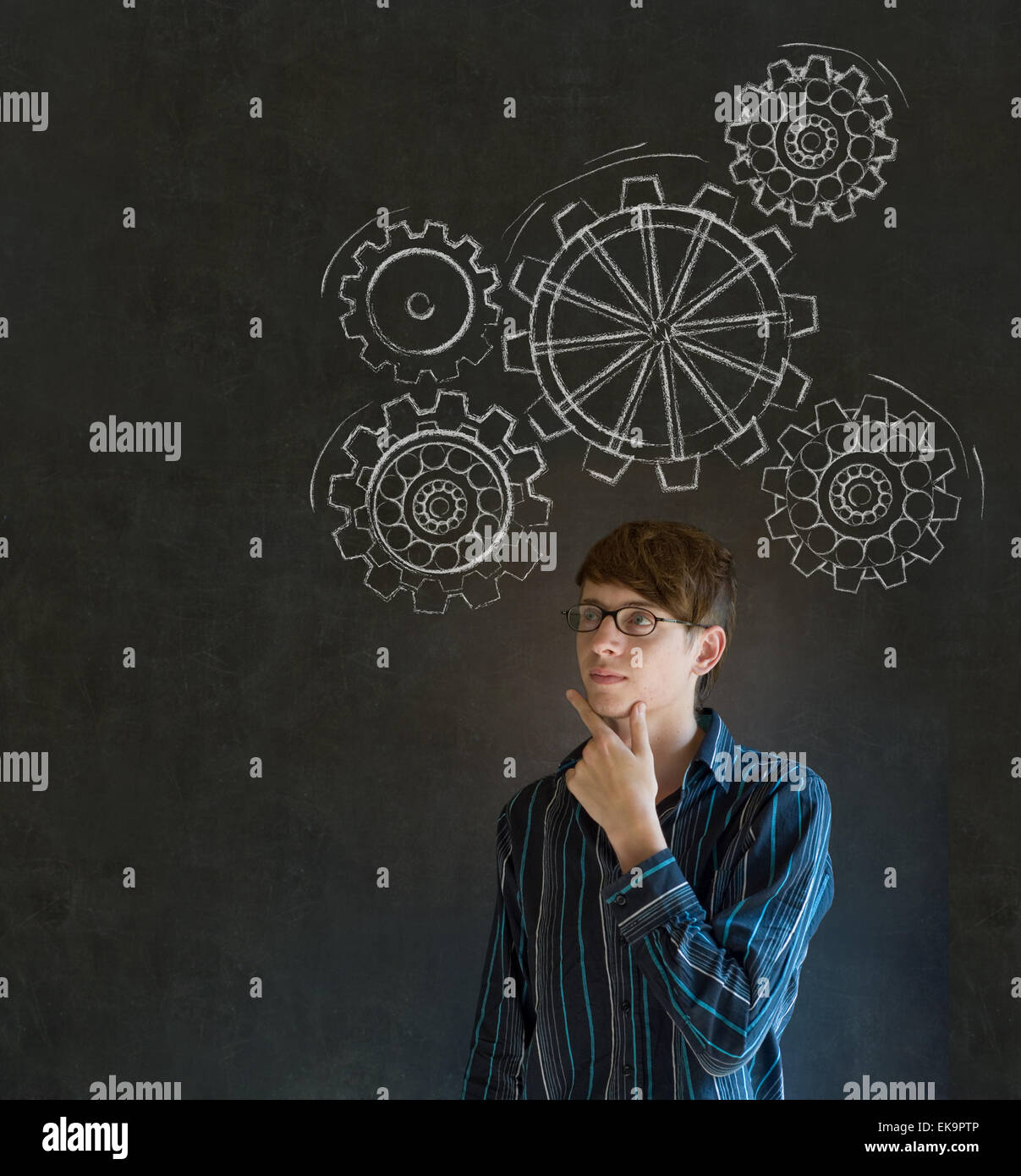 Man thinking with turning gear cogs or gears Stock Photo - Alamy