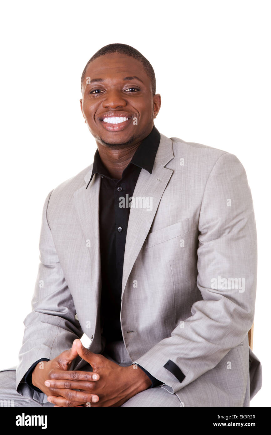 Happy smart black businessman smiling Stock Photo - Alamy