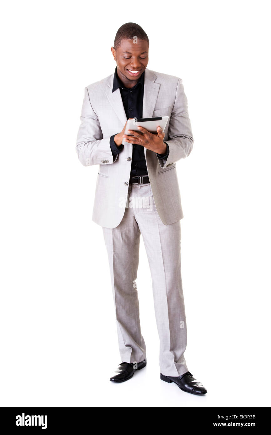 Handsome young businessman reading Cut Out Stock Images & Pictures - Alamy