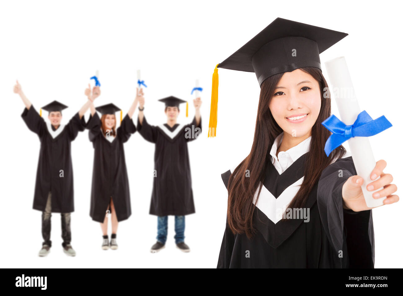 Happy graduate girl and students Stock Photo - Alamy