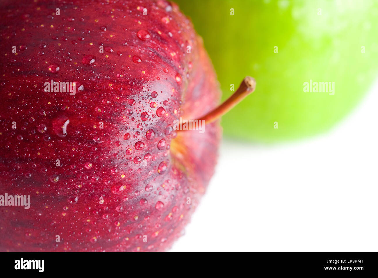 apple with water drops isolated on white Stock Photo - Alamy