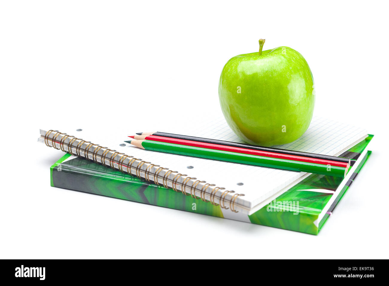apple, notebooks and pencils isolated on white Stock Photo - Alamy