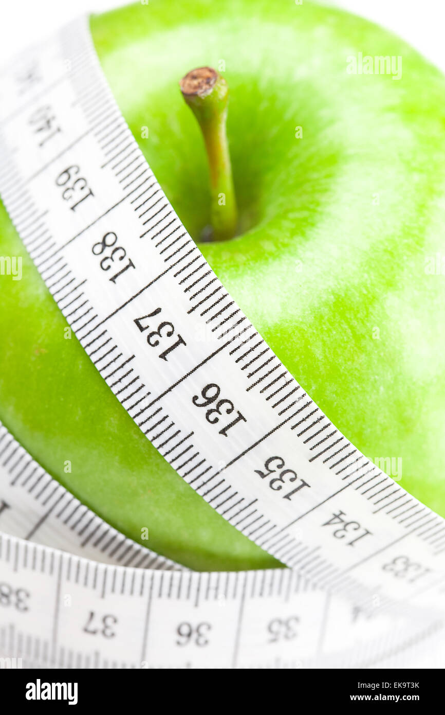 apple and measure tape isolated on white Stock Photo - Alamy