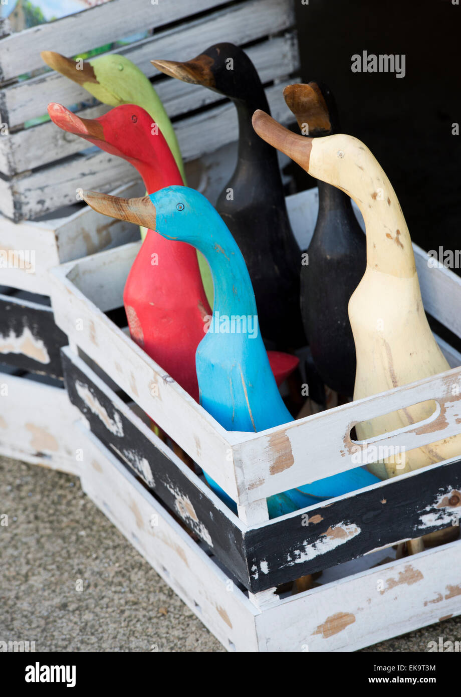 Colourful Wooden ducks in a crate Stock Photo - Alamy
