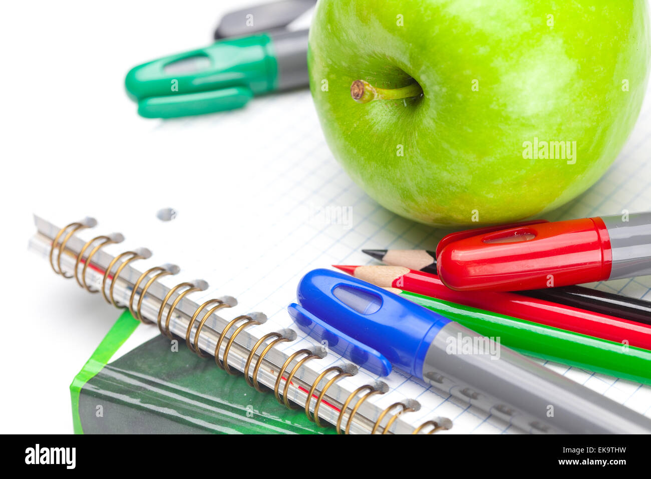 apple, notebooks and pencils isolated on white Stock Photo - Alamy