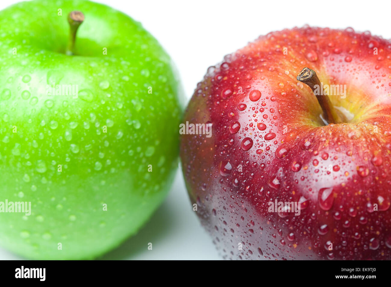 apple with water drops isolated on white Stock Photo - Alamy