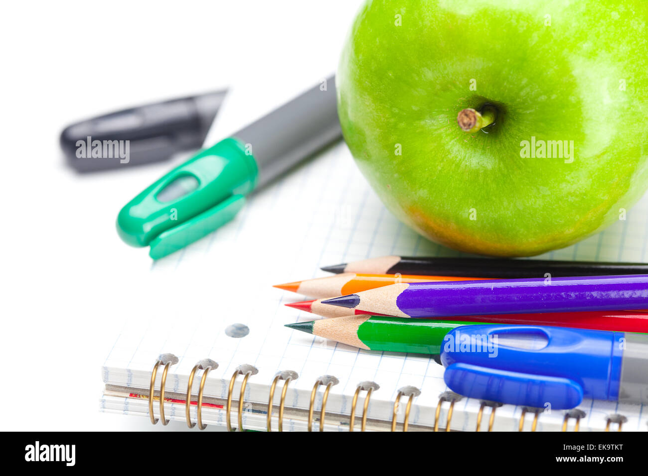 apple, notebooks and pencils isolated on white Stock Photo - Alamy