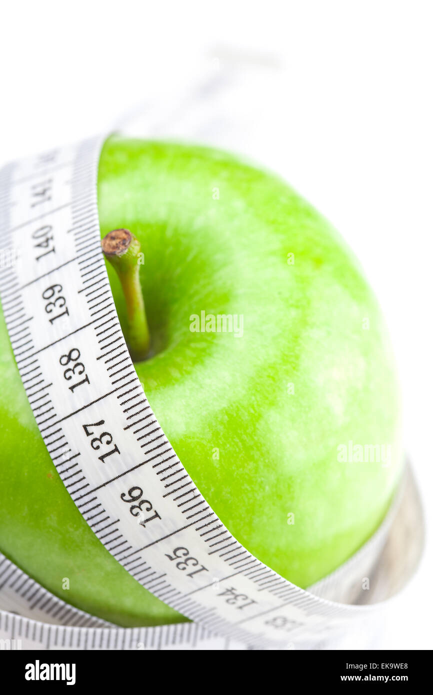 apple and measure tape isolated on white Stock Photo - Alamy
