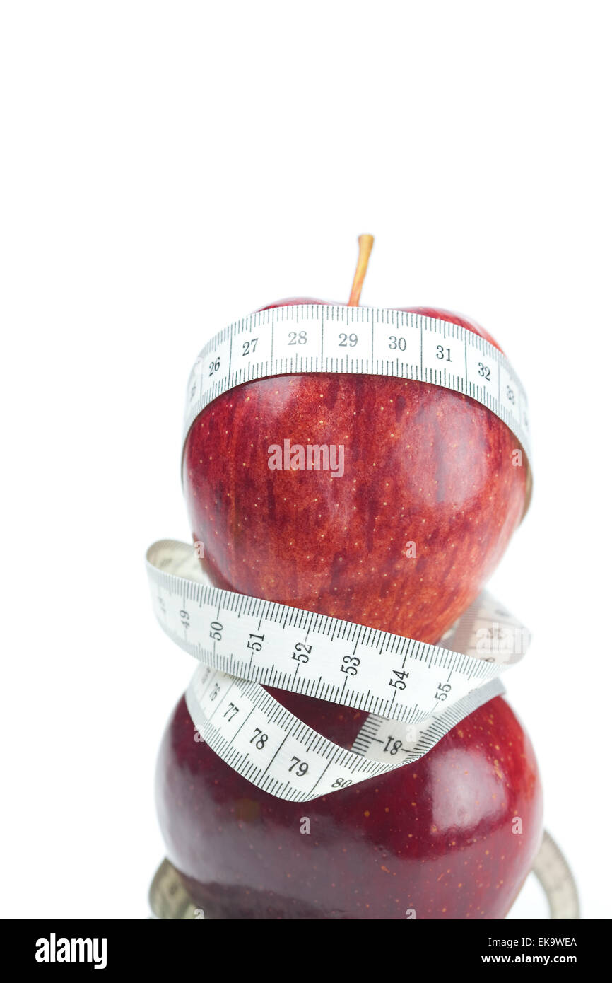 apple and measure tape isolated on white Stock Photo - Alamy