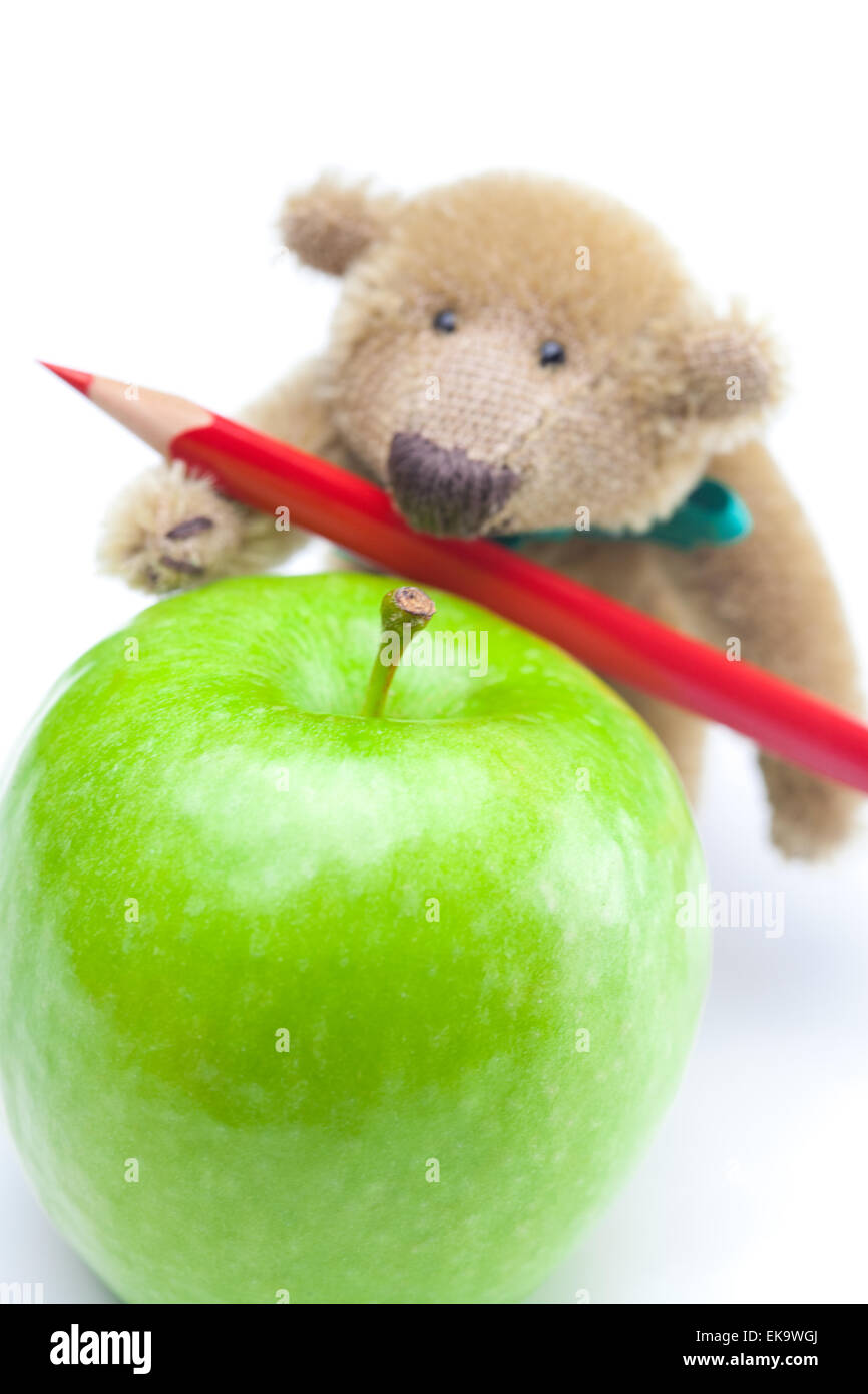 teddy bear, apple and colored pencils isolated on white Stock Photo - Alamy