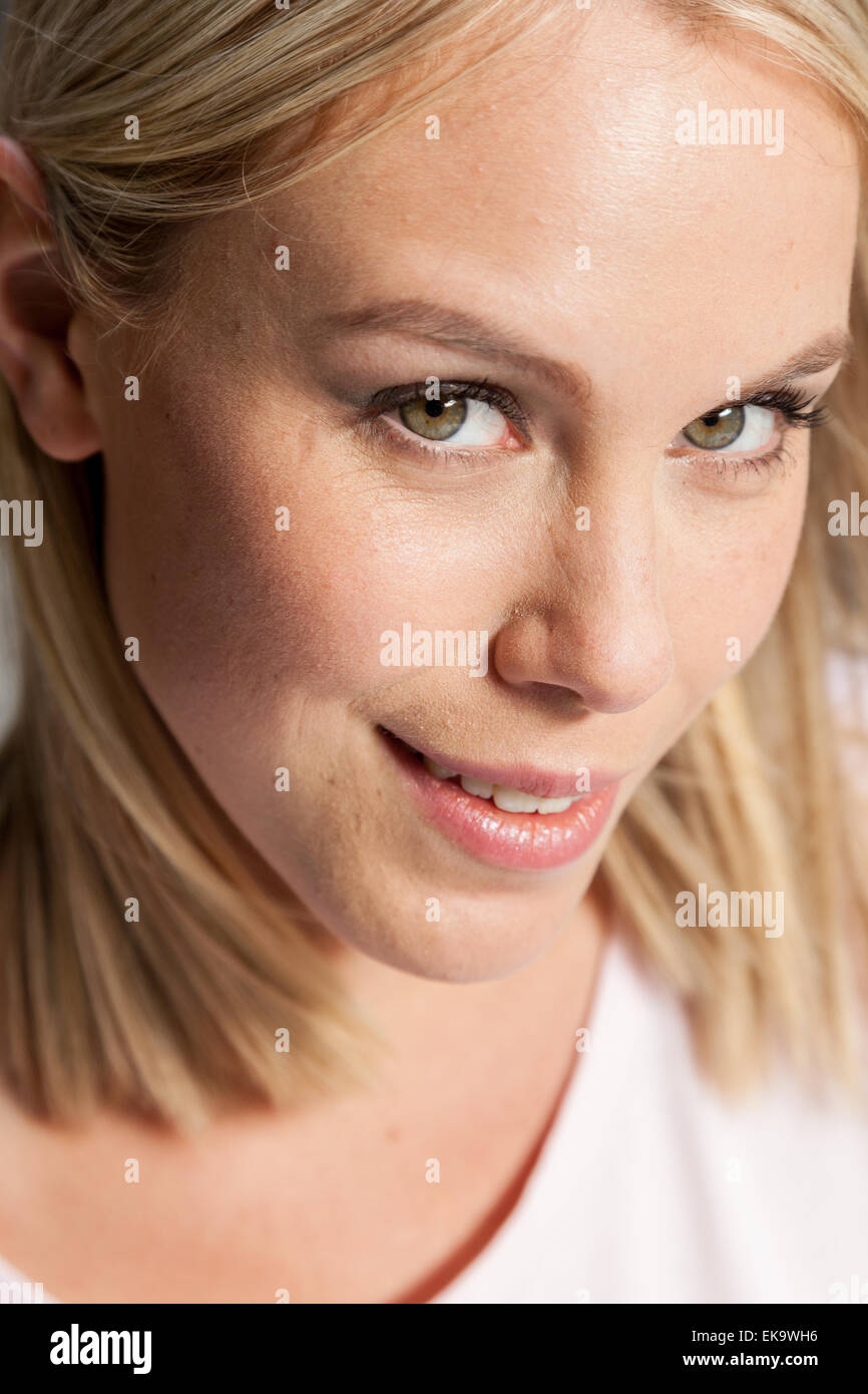 Pretty woman drinking a coffee Stock Photo - Alamy