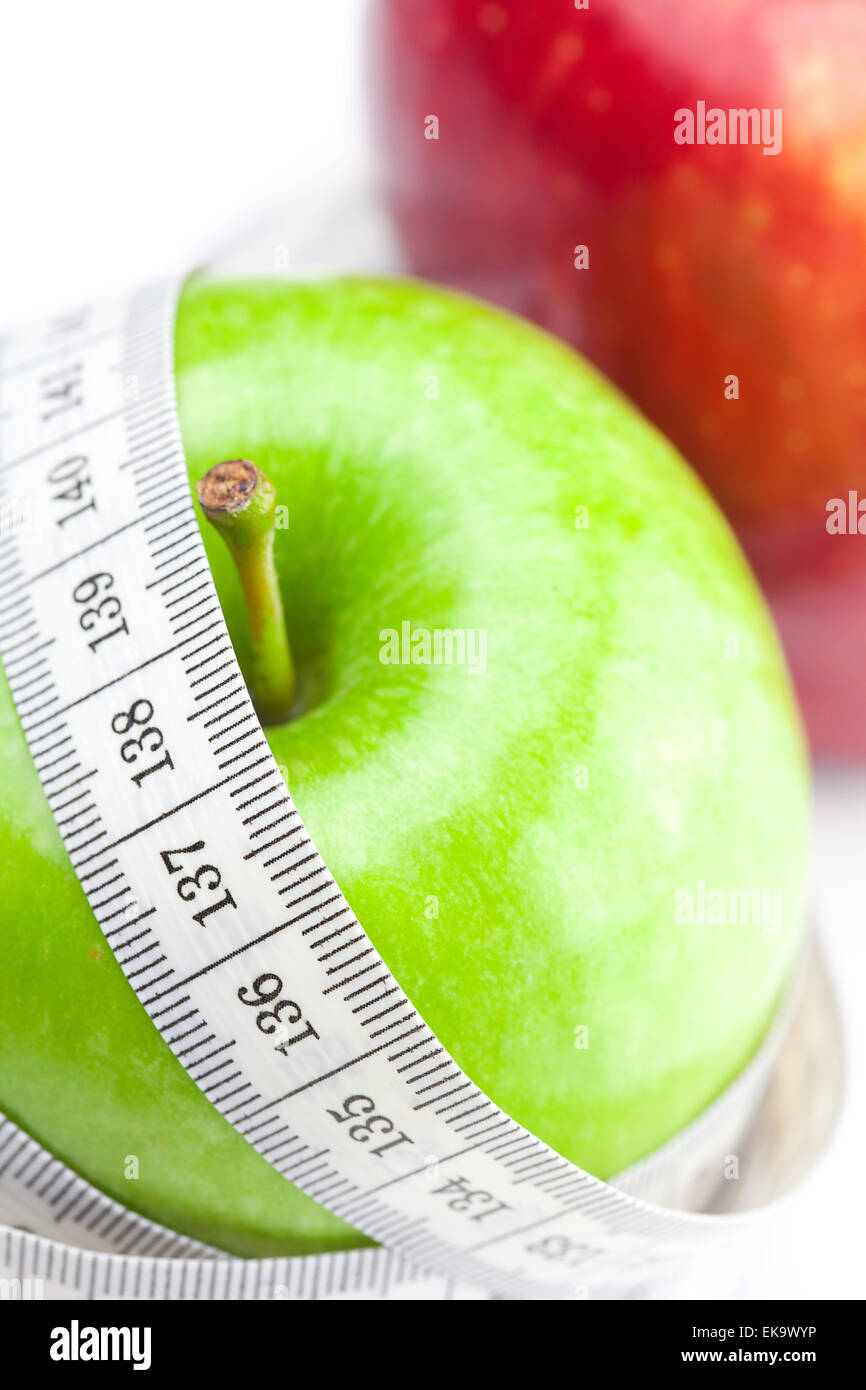 apple and measure tape isolated on white Stock Photo - Alamy