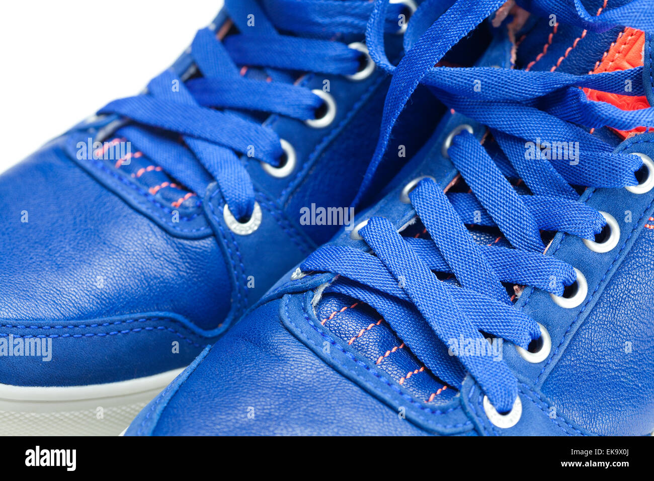 beautiful blue athletic shoes isolated on white Stock Photo - Alamy